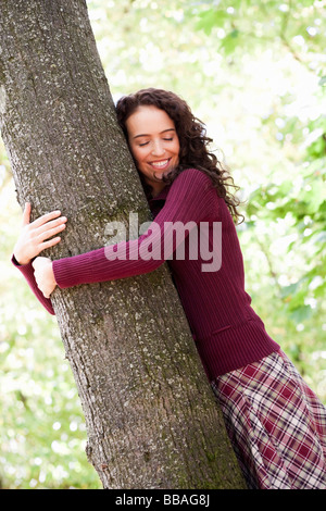 Tree hugger vertical Stock Photo - Alamy