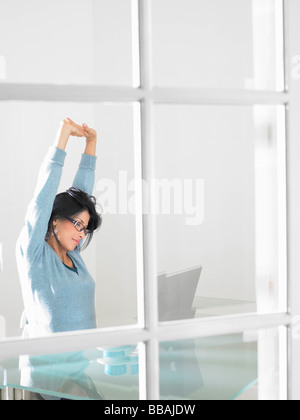 Woman working on computer in coffee shop, stock photo Stock Photo - Alamy