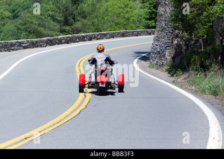 Yellow Can-Am Spyder three-wheeled trike; Motorbike rider; three ...