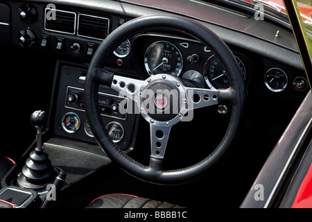 Steering wheel and dashboard of a classic 1972 MG MGB Roadster sports ...