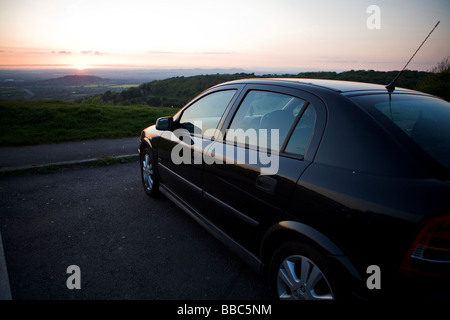 Birdlip Gloucestershire, sunset reflected on a car window Stock Photo ...