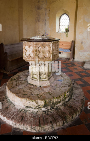 Fourteenth century baptismal font carved figures of an ecclesiastical ...