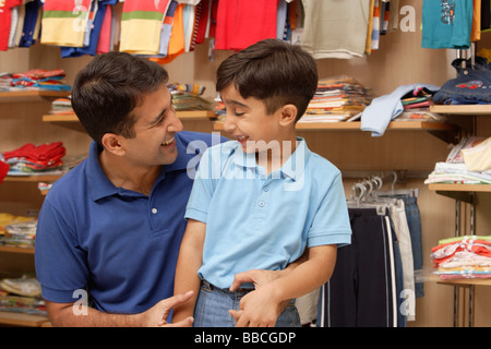 father and son in shop Stock Photo - Alamy