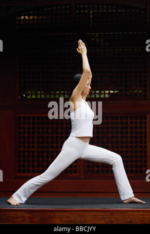 woman with arms raised, doing stretching exercises Stock Photo - Alamy