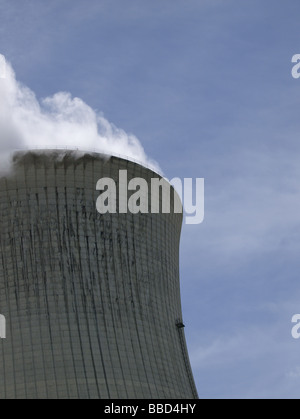 Steam rising from stack and cooling towers at nuclear power plant on ...