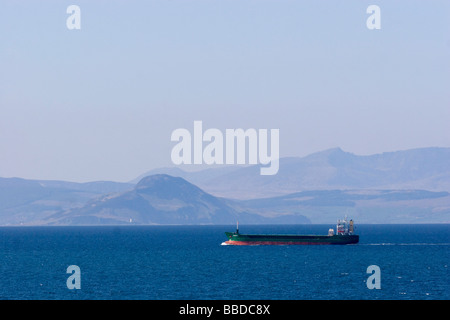 Container ship passing the Isle of Arran in the forth of clyde on the ...