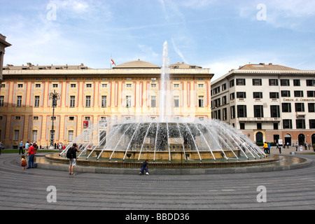 Piazza Di Ferrari Fountain in Genoa Italy Illuminated purple on a warm ...