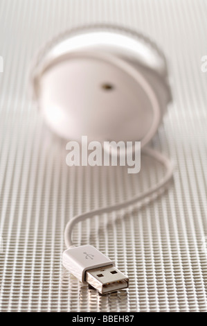 Close-up of a computer mouse and a blurry background in the background ...