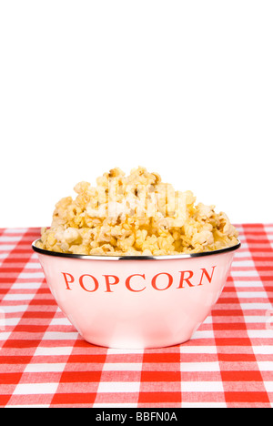 A bowl of popcorn on tablecloth Stock Photo - Alamy