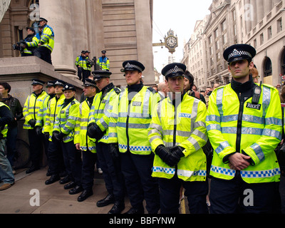 Territorial Support Group (TSG) police officers with riot shields and ...