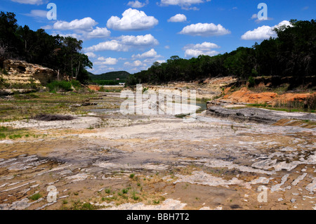 A river channel carved into the limestone in Texas Hill Country, USA ...