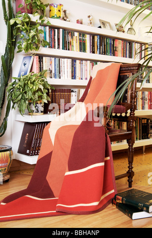 Throw draped over a chair Stock Photo: 18941856 - Alamy