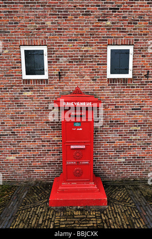 Old red post box at Zaanse Schans north of Amsterdam Stock Photo - Alamy