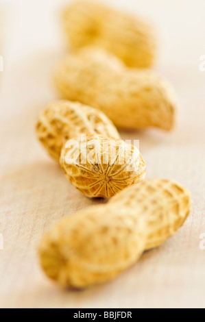 Row of peanuts in shells Stock Photo - Alamy