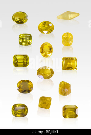 Yellow Gemstones and Crystal specimens on white background Stock Photo ...
