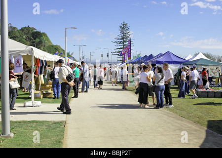 Crowds touring beachside fair with hot rod theme Stock Photo - Alamy