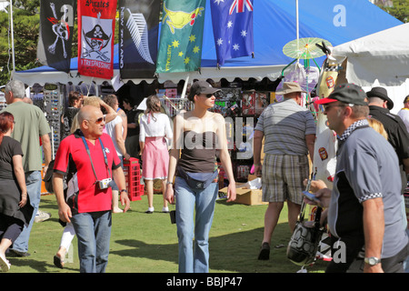 Crowds touring beachside fair with hot rod theme Stock Photo - Alamy