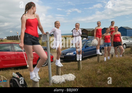 Majorettes pose on posts in red and white costumes, Hayling Island ...
