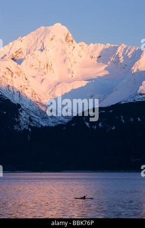 Kayaking in Resurrection Bay with the mountains of Chugach National ...
