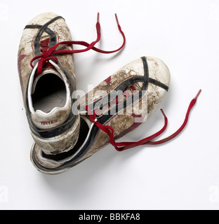 Old Dirty Soccer cleats elevated view Stock Photo - Alamy