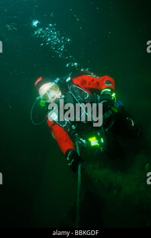 scuba diver on a ship wreck Stock Photo - Alamy