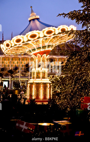 Fairground or carnival rides. Roundabouts Stock Photo - Alamy