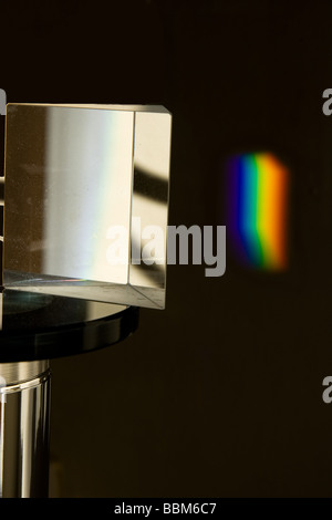 Prism dispersing light to spectrum of rainbow colors Stock Photo - Alamy