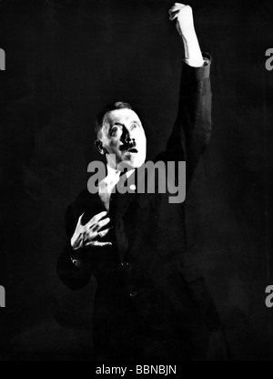 German Chancellor Adolf Hitler gestures during a speech in May 1937 at ...