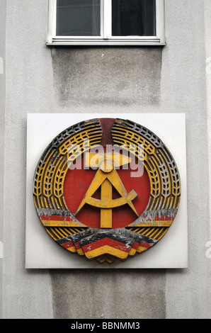 DDR east germany emblem hammer and circle red yellow black in Berlin ...