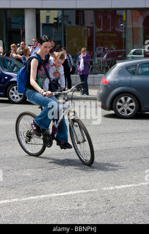 one caucasian cyclist woman cycling riding bicycle isolated on white ...