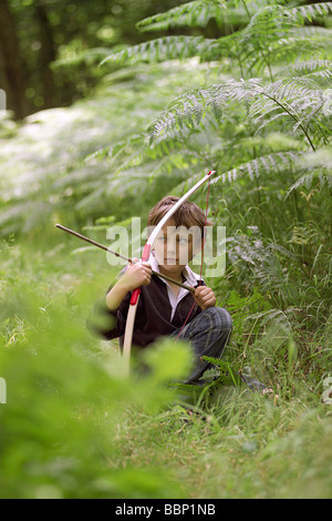 Boy playing archery Stock Photo - Alamy