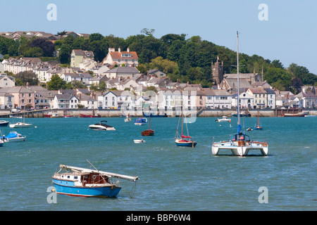 a postcard view of appledore from the shore of instow beach with boats ...