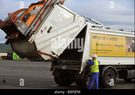 Refuse truck delivers household waste and rubbish to a transfer station ...