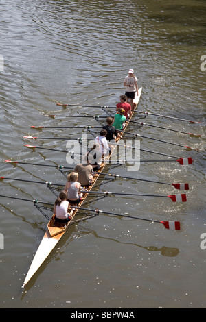 Boat coxed eight Rowers rowing on the blue lake Stock Photo - Alamy