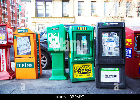 Newspaper vending boxes on street, New York City, USA Stock Photo - Alamy
