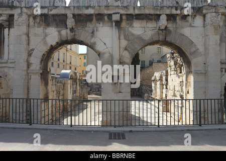 Ancient roman city gate Nimes Porta Augusta Languedoc-Rousillon Stock ...
