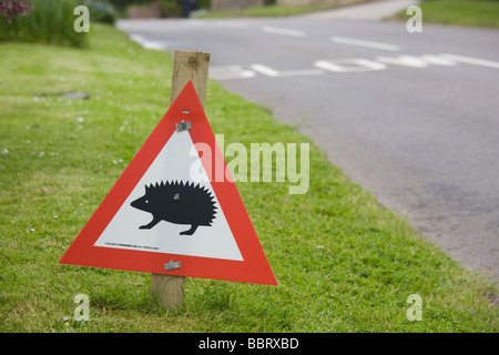 Roadside warning sign - hedgehogs Stock Photo - Alamy
