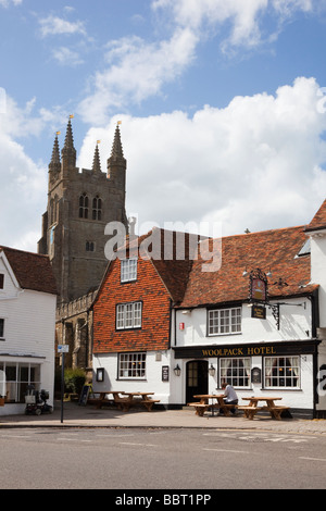 The Woolpack hotel 15th century pub exterior with tables outside in ...