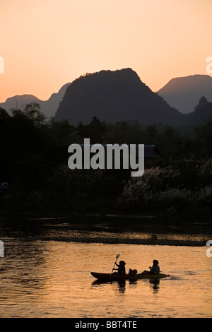 Kayaking on Song River, Vang Vieng, Laos. Nature of the valley and ...
