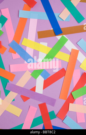 Strips of multi-colored colorful paper, all colors of the rainbow and ...