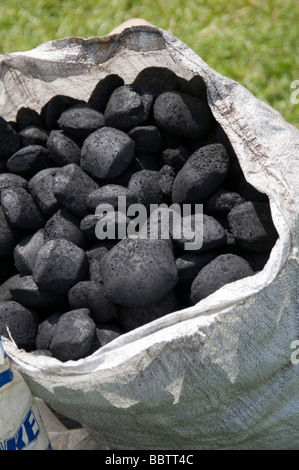 Lumps of coal and sacks Stock Photo - Alamy