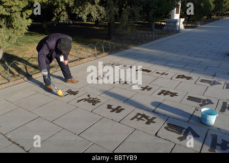 Chinese Man Practising Calligraphy Stock Photo - Alamy