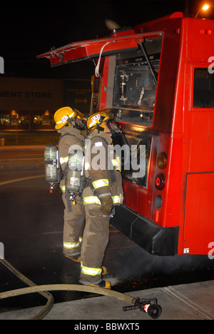 Fire engine compartment door Stock Photo - Alamy