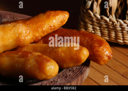 Tosha(Sweet Flour Rolls) - A flour based Dessert made with plain flour ...