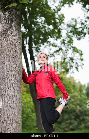 A woman doing stretching exercises, Stockholm, Sweden Stock Photo - Alamy