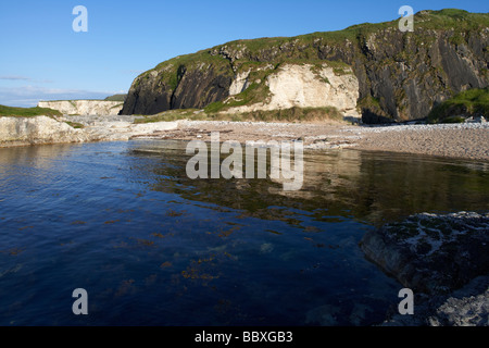 The small harbor at Ballintoy on the North Antrim Coast of Northern ...