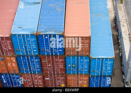 Containers onboard a docked containership await to be unloaded at ...