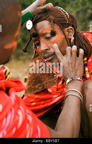 Maasai Warriors painting faces - Maji Moto Maasai Village - near Narok ...
