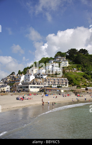 Looe beach, Cornwall, UK. Tourists enjoy the weather at Looe beach in ...
