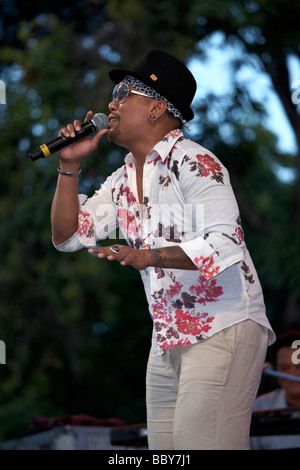 Male soloist singing with band Stock Photo - Alamy